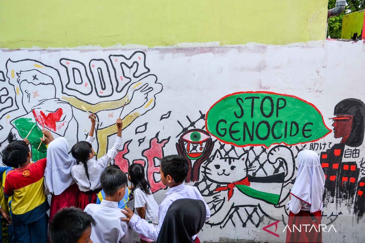 Aksi solidaritas peringatan satu tahun agresi Israel ke Palestina - ANTARA News