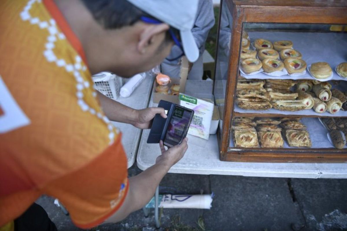 Transaksi lintas negara, Bank NTB Syariah sukses implementasikan QRIS ...