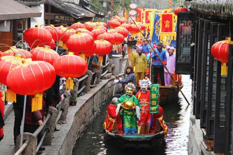 Perayaan hari lahir Dewa Kekayaan saat "Powu" dari masa ke masa ...